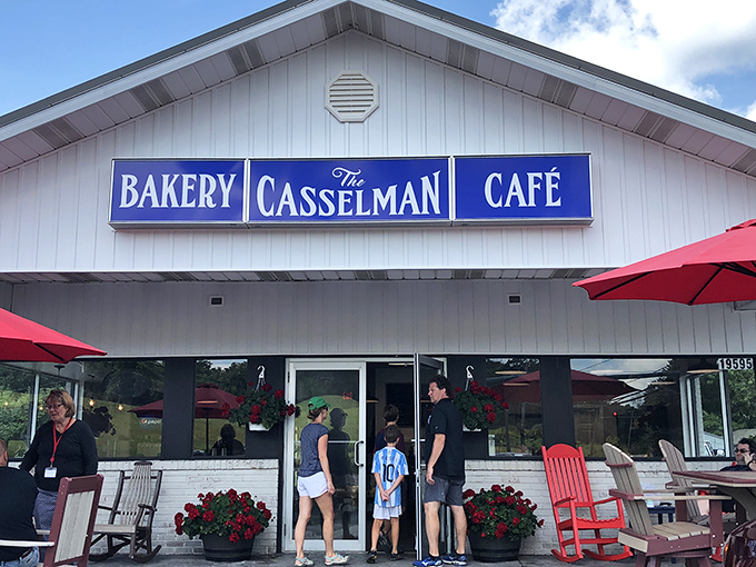 The white clapboard exterior with its bold blue sign promises comfort and carbs in equal measure. Mountain paradise found.