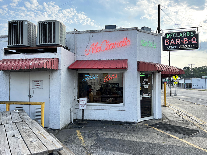 The humble white exterior of McClard's hides a smoky paradise within&mdash;proof that BBQ greatness doesn't need fancy architecture, just decades of dedication.
