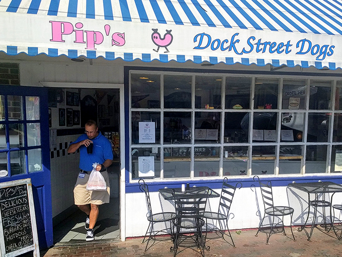 The little blue awning on Dock Street beckons like a nautical flag signal that translates to "Come get the best hot dogs in Annapolis right here!"
