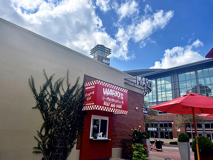 The unassuming brick exterior of Wario's might not scream "food destination," but that red checkered sign is like a beacon for sandwich aficionados across Columbus.