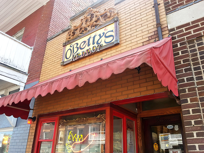 The unassuming storefront of O'Betty's beckons like a red-awninged oasis in Athens. This tiny hot dog temple proves great things come in small packages.