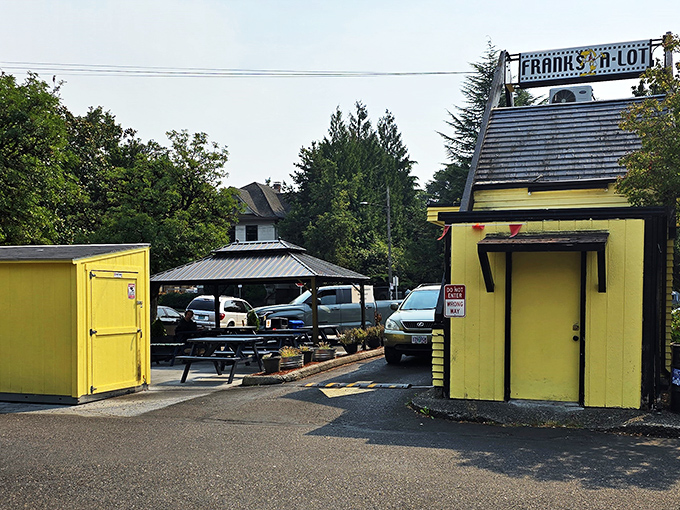 
The sunshine-yellow A-frame stands like a beacon of hope for the hungry. Portland's hot dog paradise doesn't need fancy architecture to make a statement. 