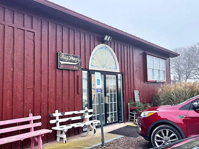 The rustic exterior of Big Dan's BBQ promises smoky treasures within. Red picnic tables invite you to dive into Pennsylvania's answer to Southern barbecue royalty.