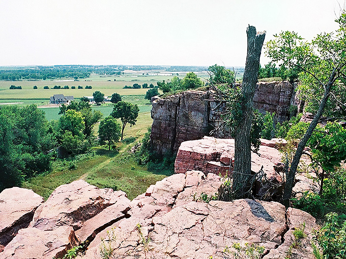The dramatic quartzite cliffs of Blue Mounds rise like nature's skyscrapers from the prairie, a geological marvel that would make the Grand Canyon blush with envy.