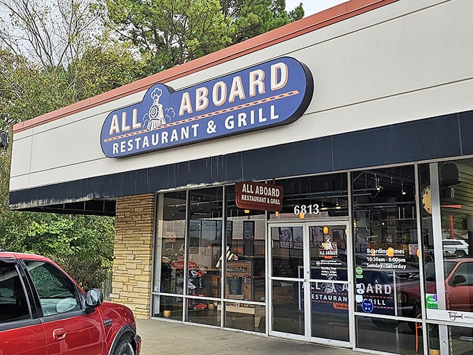 The blue locomotive sign beckons hungry travelers like a friendly conductor. All Aboard's unassuming strip mall location hides a culinary journey worth taking.