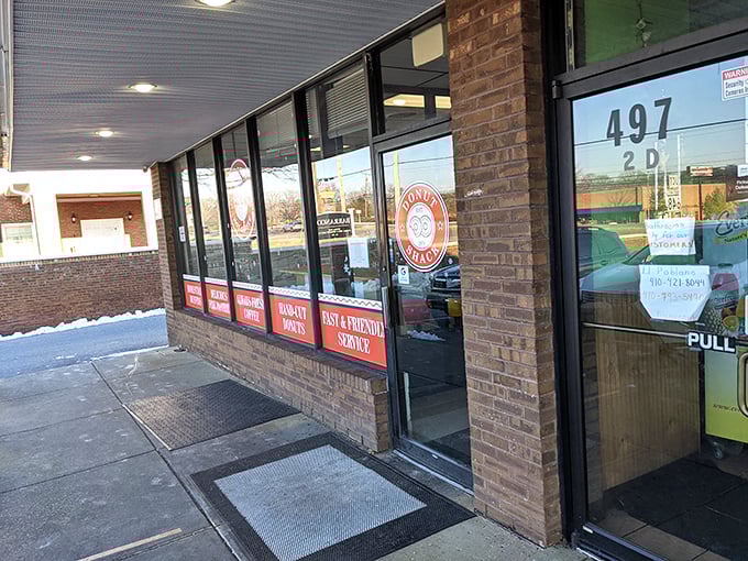 The unassuming storefront that houses donut greatness. Like finding a Michelin star restaurant in a strip mall, Donut Shack's exterior promises simple pleasures done extraordinarily well.