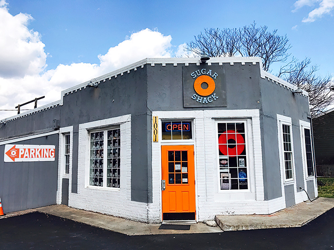 That iconic orange door isn't just an entrance&mdash;it's a portal to donut nirvana. The unassuming gray exterior hides Richmond's sweetest secret.
