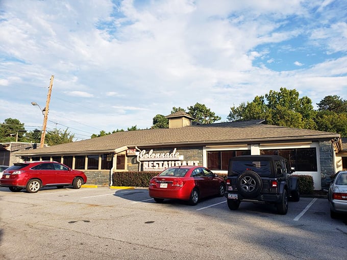 The unassuming exterior of The Colonnade belies the culinary treasures within. Atlanta's fried chicken sanctuary has been drawing devotees for decades.