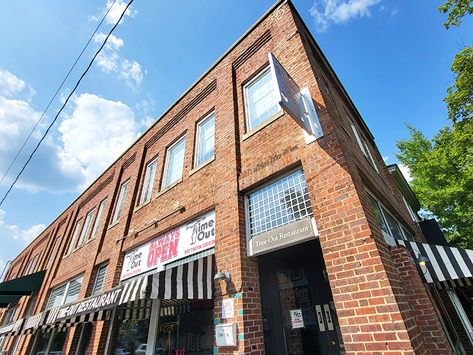 The brick facade of Time-Out beckons hungry visitors with its iconic striped awning and neon signs&mdash;a 24/7 beacon of Southern comfort on Franklin Street. 