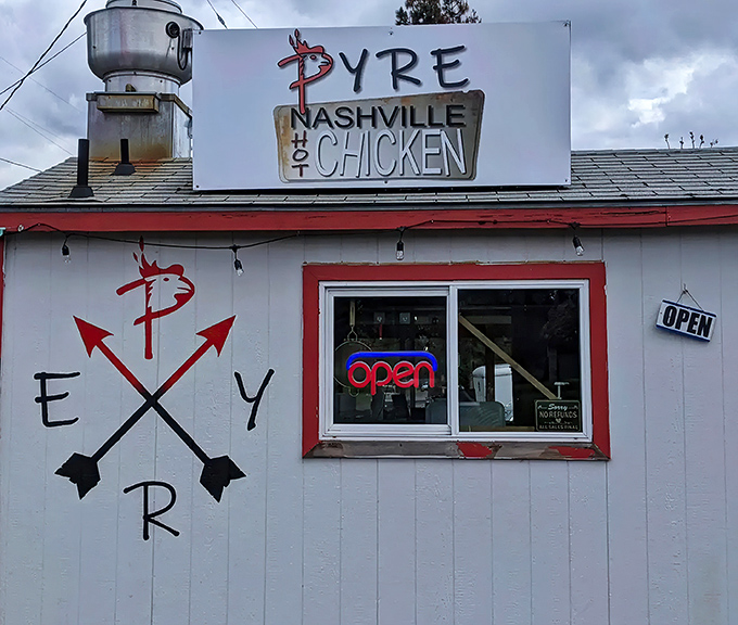 The unassuming white shack with its bold red logo promises a flavor explosion that belies its humble exterior. Southern heat meets Pacific Northwest charm. 