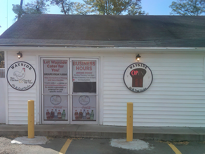 The unassuming white building with its iconic sign promises "Ole' Virginia Fried Chicken" &ndash; a beacon of hope for hungry travelers seeking authentic Southern comfort. 