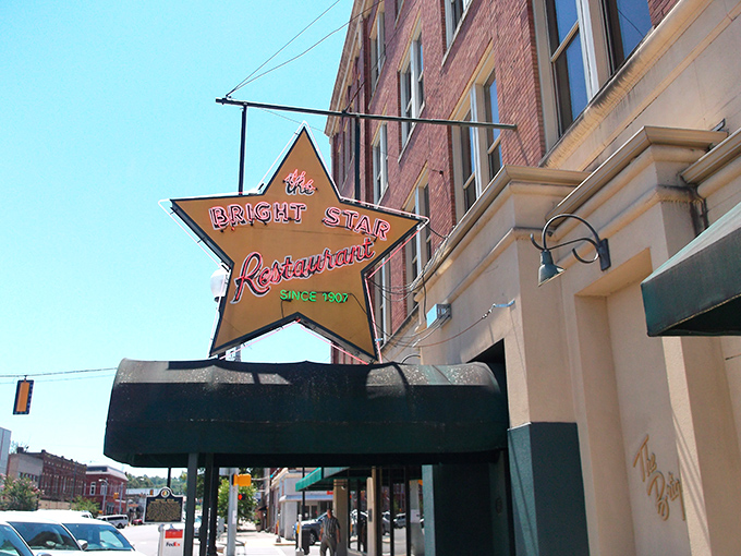 The iconic star-shaped neon sign glows like a beacon for hungry travelers. This isn't just a restaurant&mdash;it's a Bessemer landmark that's been calling folks home since 1907.