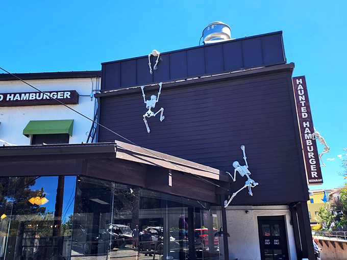 Those skeleton climbers on the exterior aren't just Halloween decorations—they're year-round greeters warning you that these burgers might be to die for.