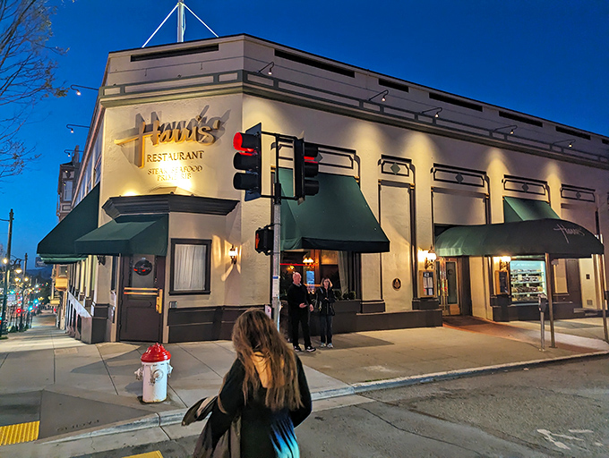 Harris' Restaurant glows with old-school charm at dusk, those signature green awnings beckoning like a carnivore's lighthouse in the San Francisco fog. 