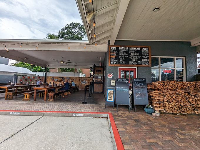 The unassuming exterior of Crydermans hides barbecue greatness like a superhero's secret identity. Stacked firewood isn't decor&mdash;it's a promise of smoky deliciousness to come.