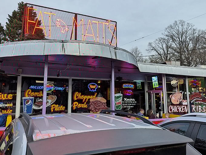 The neon glow of Fat Matt's sign is like a barbecue beacon in the night, calling hungry souls to meat salvation on Piedmont Avenue.