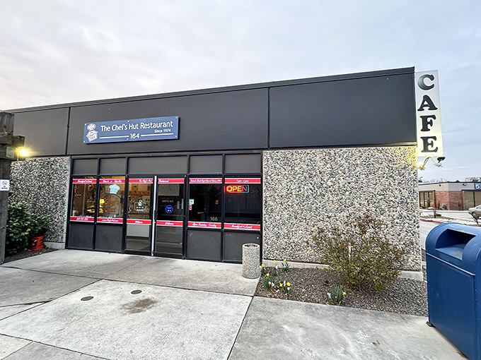 The unassuming blue exterior of The Chef's Hut promises no frills, just honest-to-goodness breakfast mastery that locals have treasured for decades.