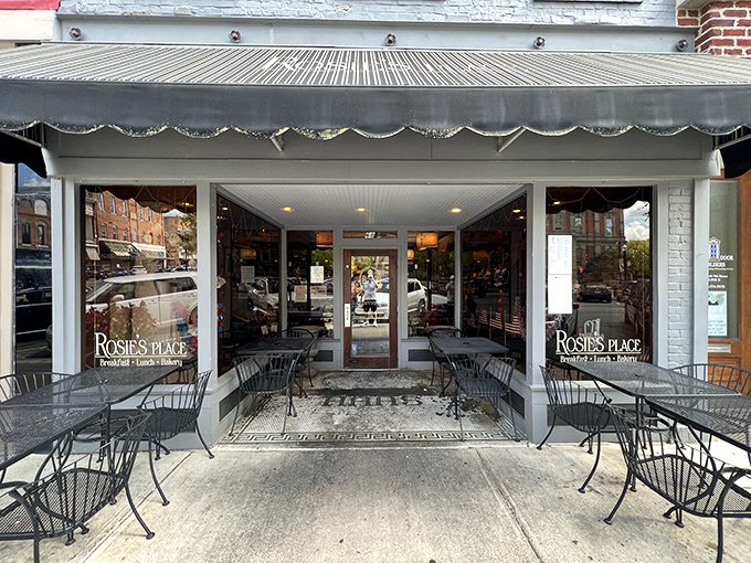 The charming storefront of Rosie's Place beckons with its classic awning and inviting outdoor seating. Downtown Noblesville's breakfast gem awaits.