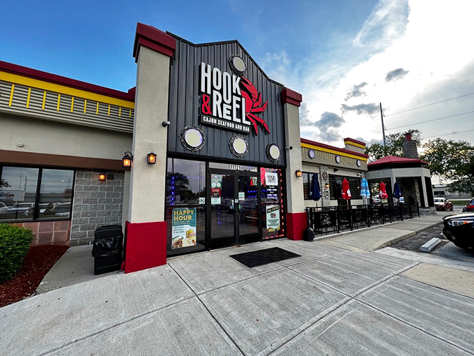 The nautical-themed exterior of Hook & Reel stands like a lighthouse for seafood lovers in landlocked Kansas, complete with those charming porthole windows.