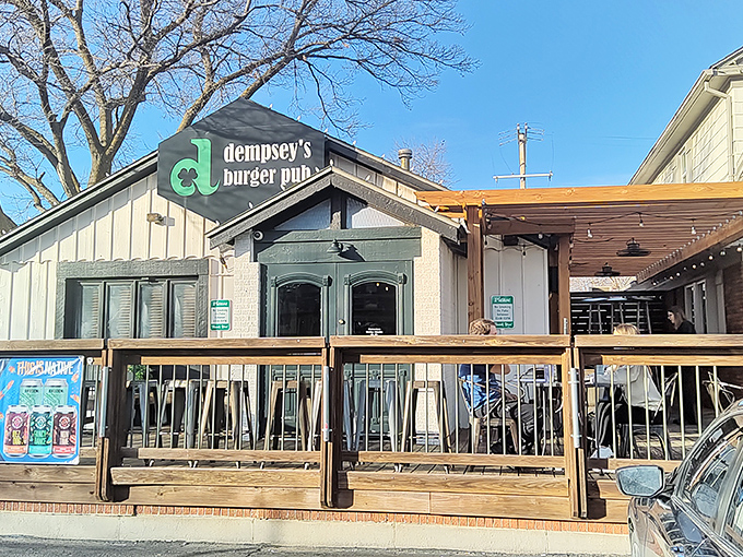 Dempsey's white cottage-like exterior stands proudly in Wichita, its distinctive green logo beckoning burger enthusiasts like a meaty lighthouse on a hungry sea.