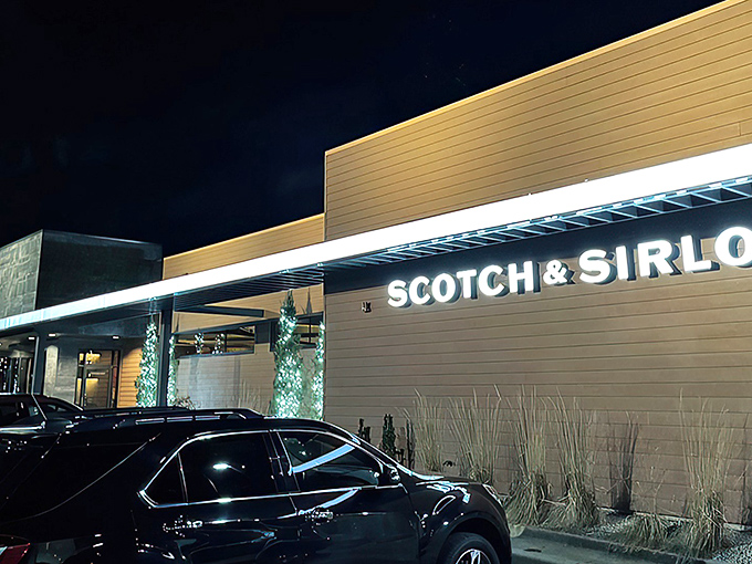 The iconic entrance to Scotch & Sirloin, where those stone lions aren't just guarding the door&mdash;they're keeping the vegetarians at bay.