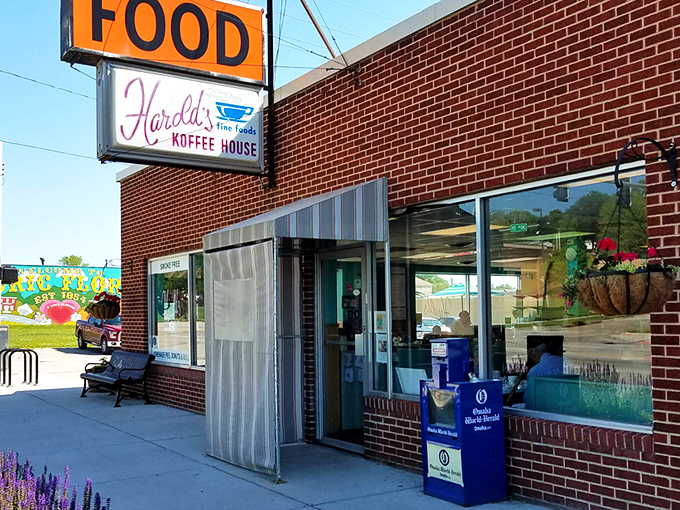 Harold's brick exterior stands like a time capsule on North 30th Street, complete with vintage signage and a welcoming bench that practically whispers "slow down."