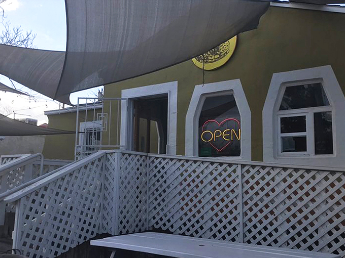 The cheerful mustard-yellow exterior of Tia B's La Waffleria stands like a beacon of breakfast hope in Albuquerque's landscape. 
