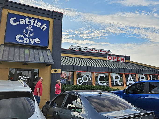 The bright yellow exterior boldly proclaims "GOT CRAB!" like a seafood beacon in landlocked Oklahoma. No pretense, just a promise of oceanic treasures within.
