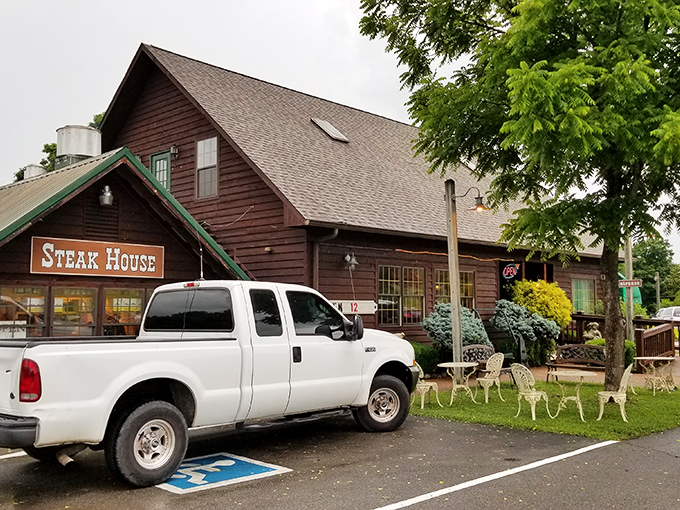 The rustic log cabin exterior of Trailhead Steak & Trout House promises what every great Tennessee meal should: honest food with no pretense, just pure deliciousness.