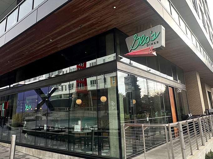 Glo's sleek new digs blend modern architecture with that classic diner charm. The wooden accents and glass frontage say "Yes, we've grown up, but we still remember where we came from."