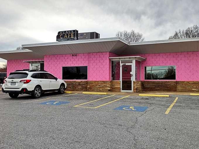 The pink palace of poultry stands proudly against the Arkansas sky, like a delicious mirage beckoning hungry travelers from miles around.