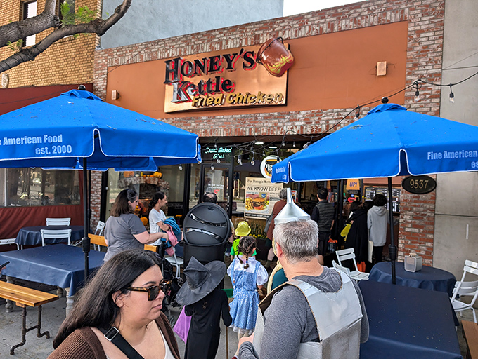 The brick-faced storefront with its iconic sign and blue awning promises what might be California's most perfect fried chicken experience.