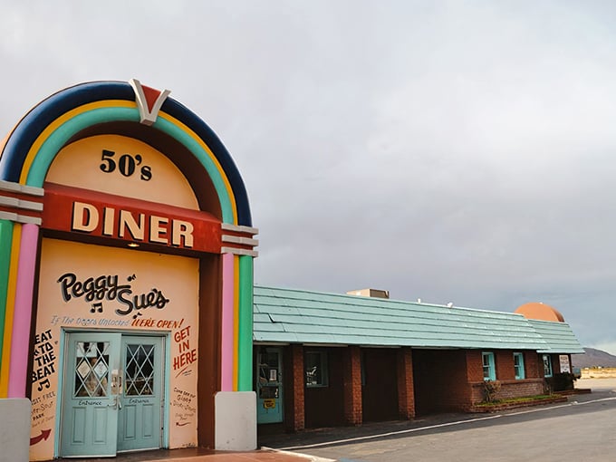 The rainbow-colored archway of Peggy Sue's beckons like a time portal in the desert. This isn't just a pit stop&mdash;it's a destination.