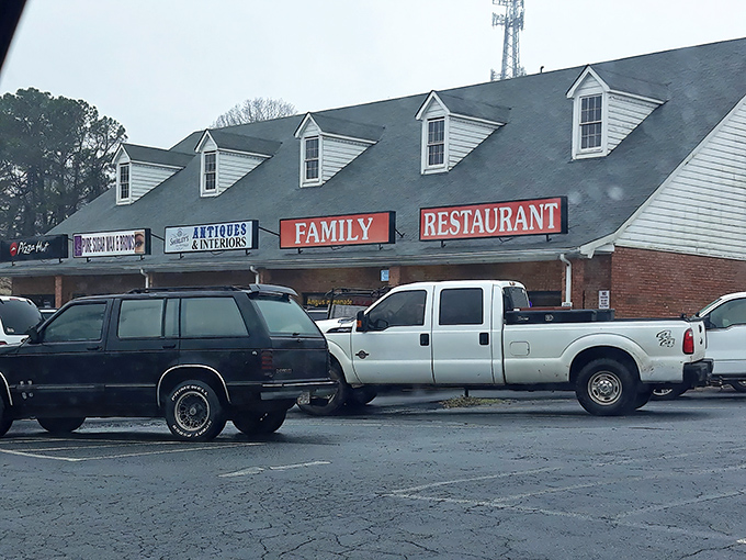 The culinary equivalent of a warm hug awaits behind those bold orange signs. Family Restaurant's unassuming exterior in Duluth promises zero pretension and maximum comfort.