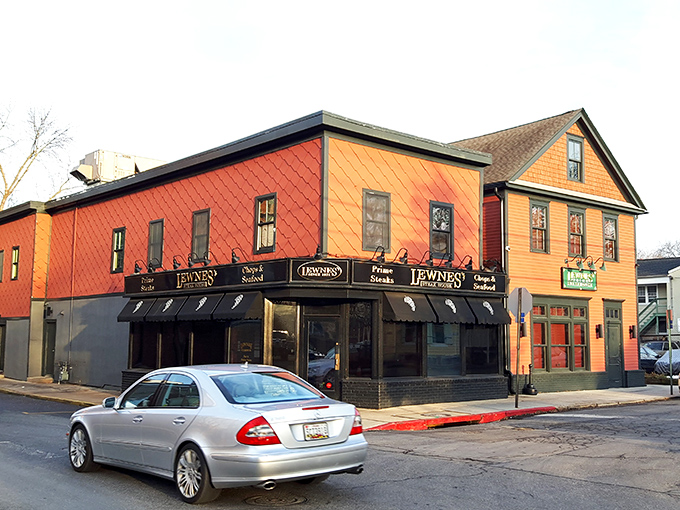The unassuming corner building with its distinctive red exterior houses culinary treasures that would make even the most jaded carnivore weep with joy.