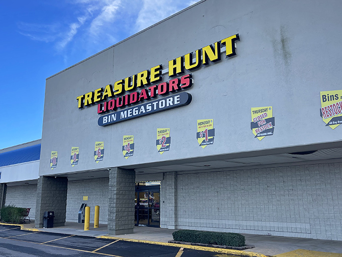 The bright yellow signage of Treasure Hunt Liquidators beckons bargain hunters like a retail lighthouse in Norfolk's commercial landscape.