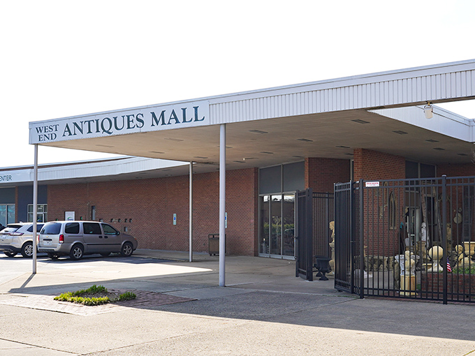 The unassuming exterior of West End Antiques Mall belies the wonderland within. Like a time-travel portal disguised as a strip mall storefront.