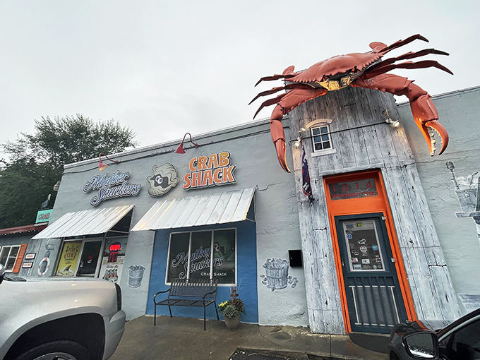 The blue exterior of Mother Shuckers stands out like a coastal mirage in Martinsburg, promising seafood treasures that seem impossible this far from the ocean.
