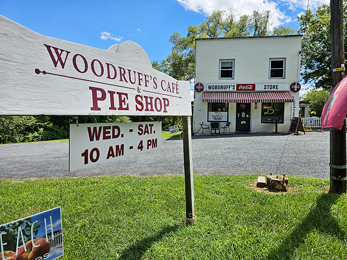 The classic red-and-white striped awning and vintage Coca-Cola signs aren't retro decoration&mdash;they're authentic pieces of Woodruff's history as a former general store.