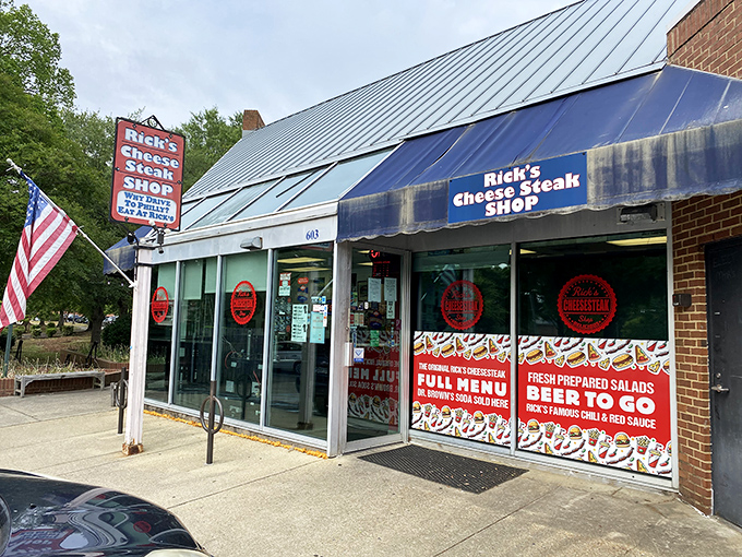 The blue awning and iconic sign beckon like an old friend. "Why drive to Philly?" Indeed, why would you when this cheesesteak paradise awaits?