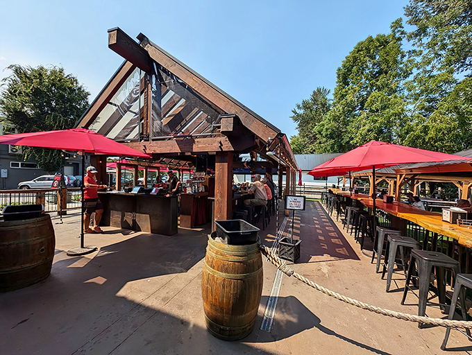 The timber-framed outdoor seating area beckons like an old friend, promising cold brews and mountain views that'll make your city stress evaporate instantly.