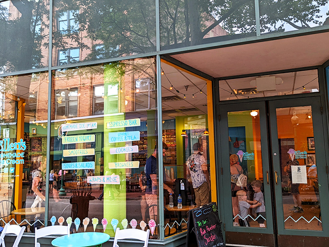 Ellen's vibrant storefront beckons from Capitol Street like a colorful oasis in downtown Charleston. That clock isn't just telling time&mdash;it's counting down to your next ice cream fix.