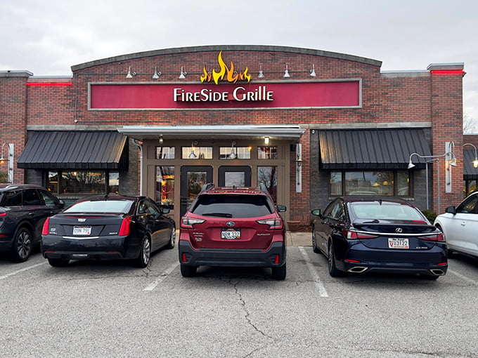 The fiery red glow of FireSide Grille's sign cuts through the night like a beacon for hungry souls wandering Hurricane's streets.