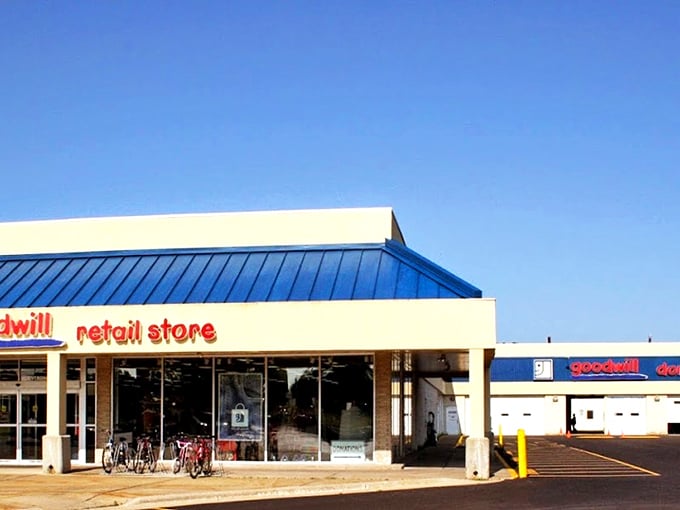 The blue-roofed treasure chest of Madison awaits! Goodwill Nakoma stands like a retail fortress where bargain hunters begin their day-long quests.