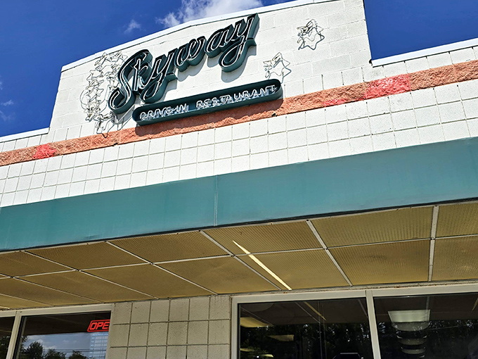 The white-tiled time machine with its signature green awning beckons hungry travelers. This isn't retro by design&mdash;it simply never stopped being wonderful.