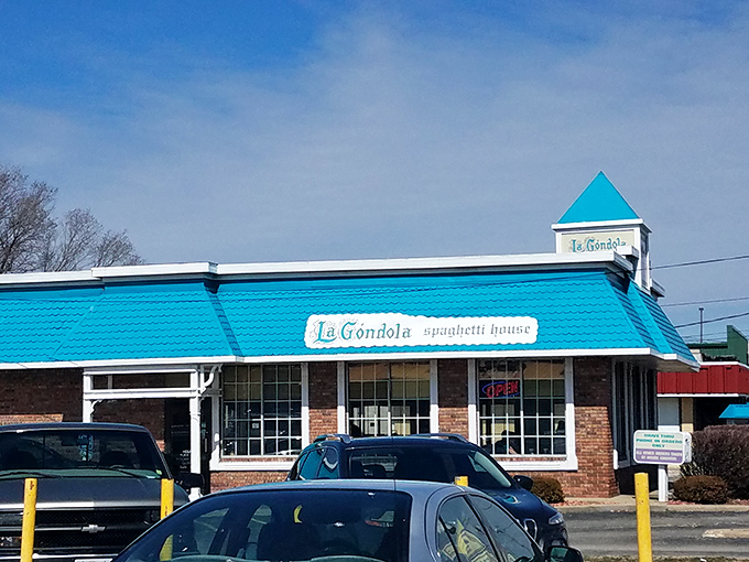 That distinct turquoise roof isn't just eye-catching—it's a beacon for pasta pilgrims. La Gondola's humble exterior hides culinary treasures worth discovering.