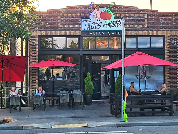 That neon tomato sign isn't just winking at you&mdash;it's inviting you into a brick-fronted paradise where pasta dreams come true. 