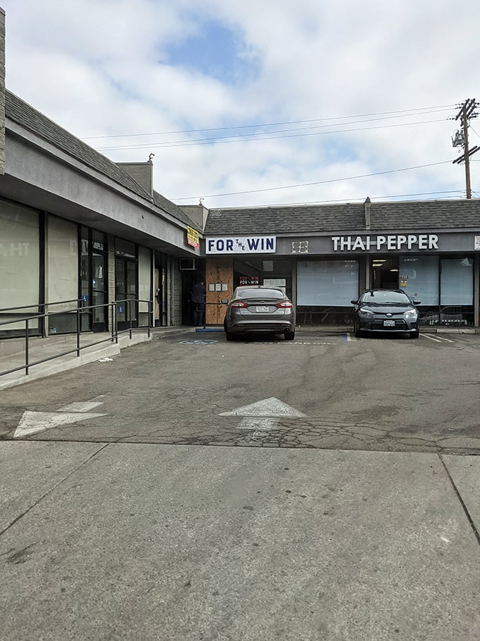The unassuming strip mall exterior of For The Win proves once again that culinary treasures often hide in the most ordinary-looking places.