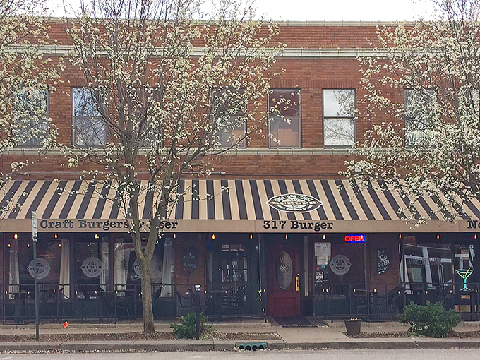 The unassuming storefront of 317 Burger might not stop traffic, but the aroma wafting from inside should require a special permit.