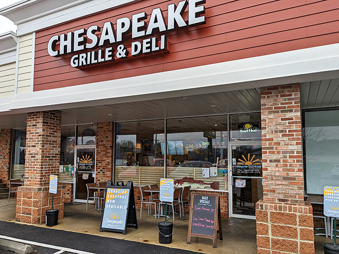 The unassuming exterior of Chesapeake Grille & Deli hides culinary treasures within, like a delicious speakeasy for burger enthusiasts.